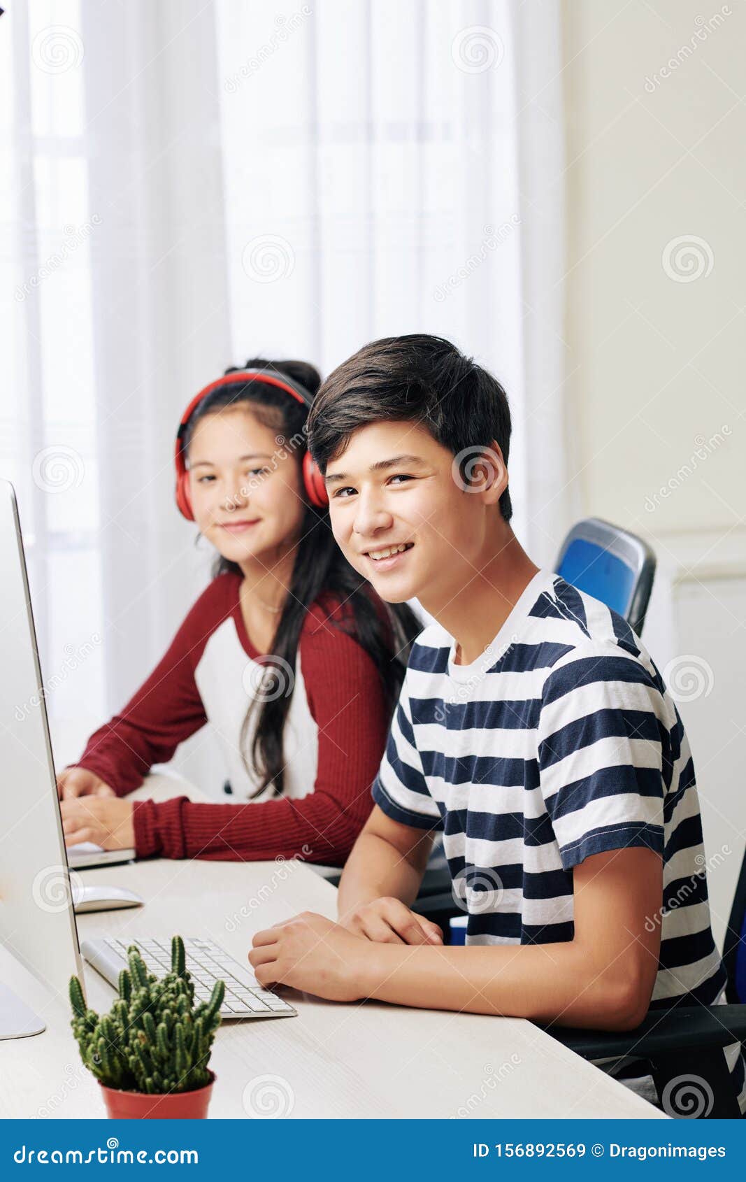 Positive Teenagers Working on Computers Stock Image - Image of sitting ...