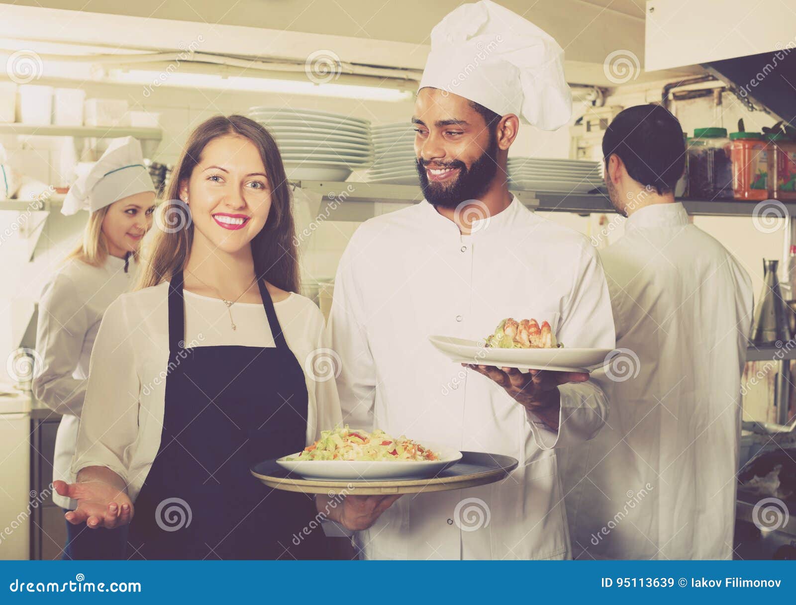 Positive Waitress and Cooking Team Stock Image - Image of colleagues ...