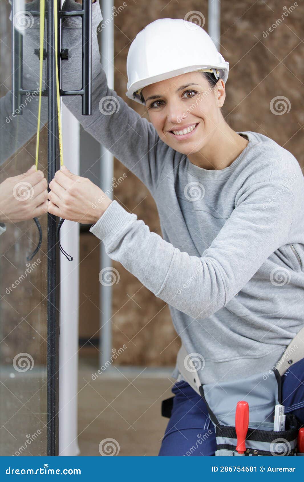 Positive Woman with Meter on Wall Stock Image - Image of measuring ...