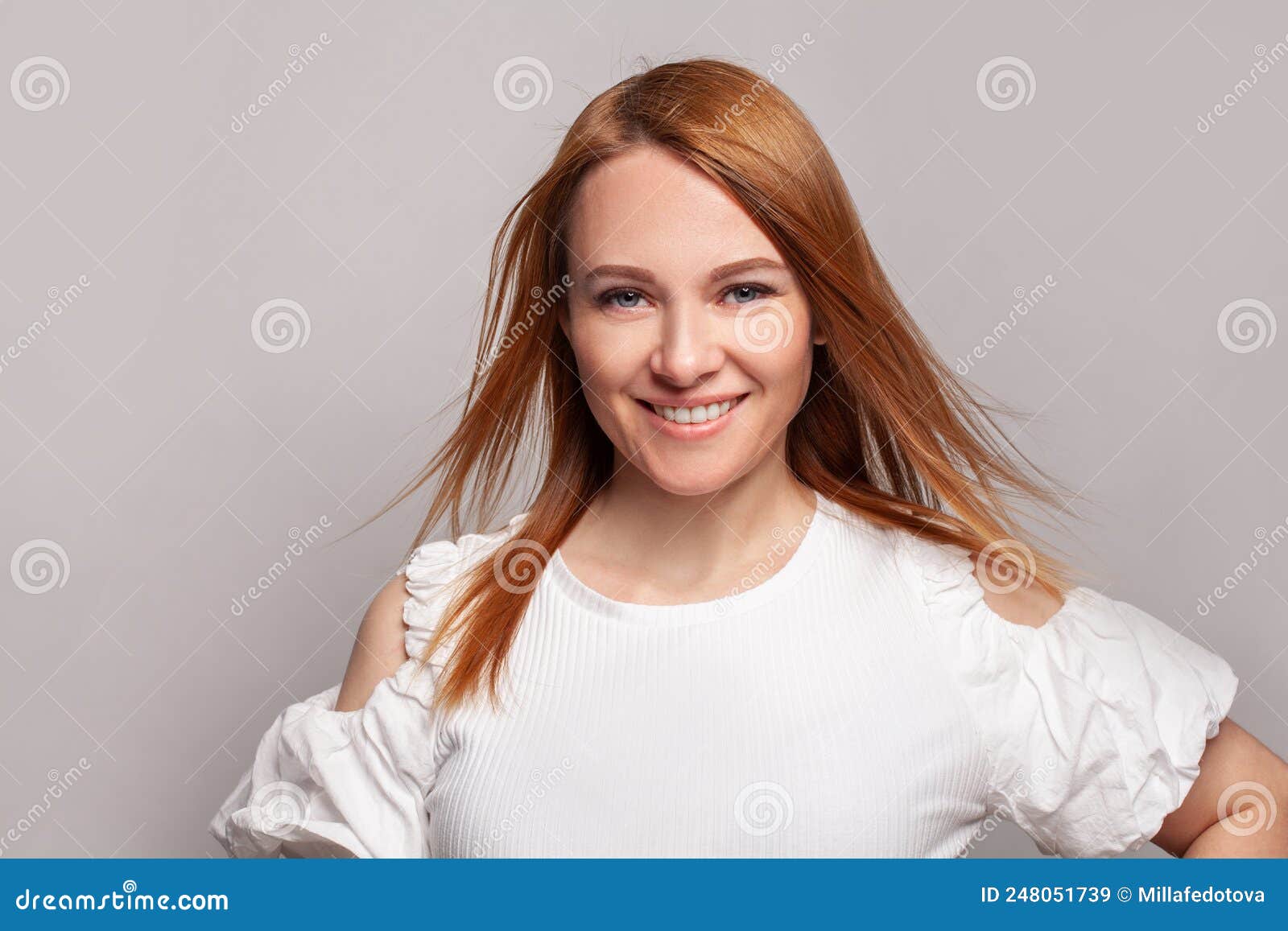 Positive Woman Redhead Fashion Model With Long Smooth Wind Blowing Red