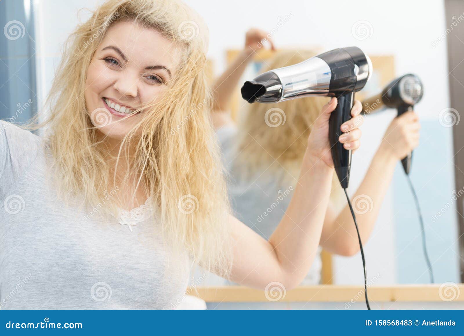 Blonde Woman Using Hair Dryer Stock Image Image Of Blonde Hairdryer