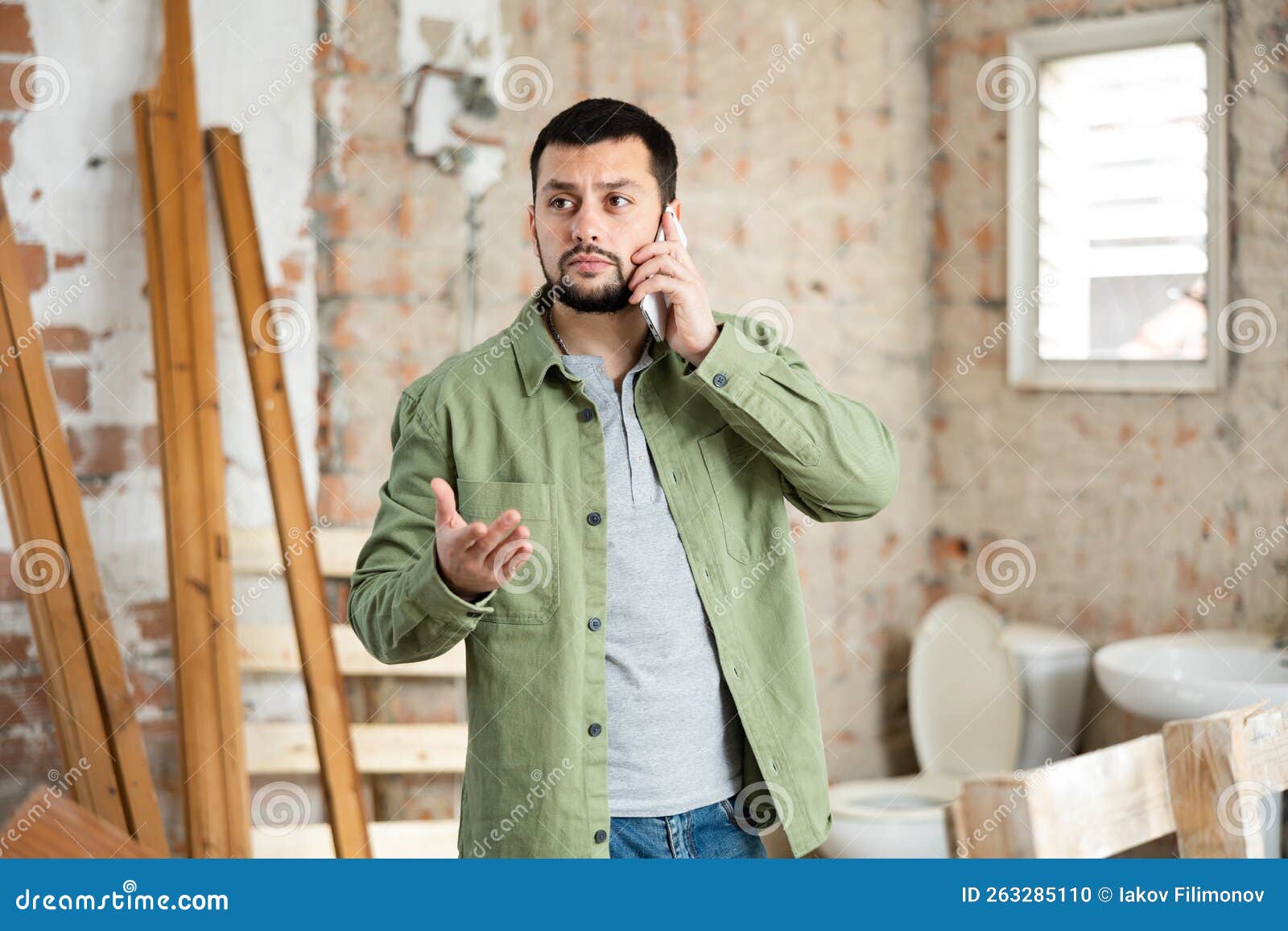 Architect Talking on Phone at Construction Site Stock Photo - Image of ...