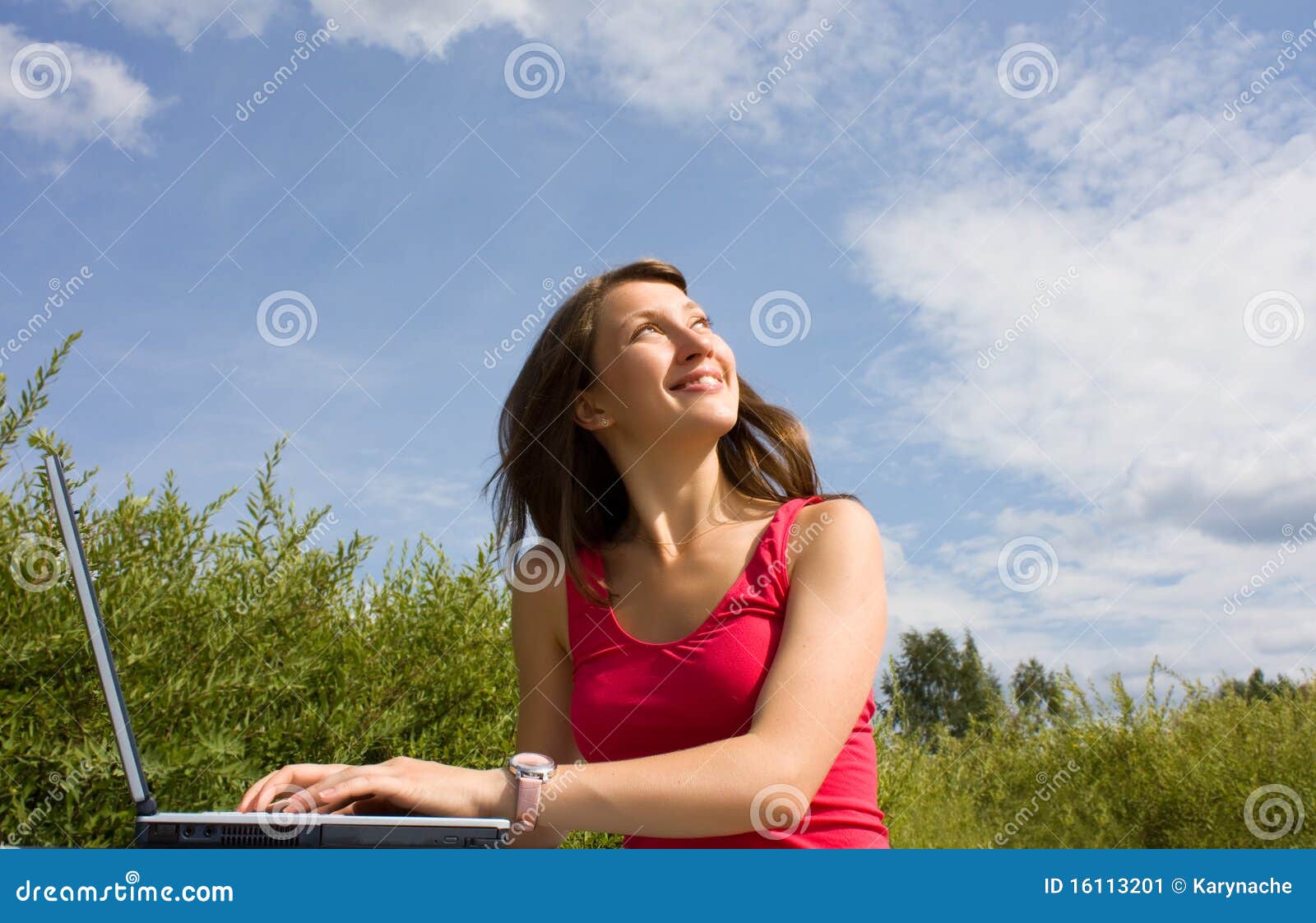 Positive Young Lady is Looking Up. Laptop Stock Image - Image of field ...