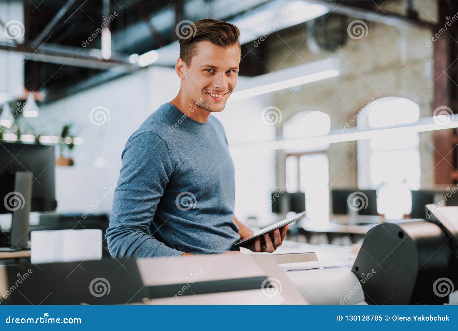 Positive Young Man Working in the Typography Stock Image - Image of ...