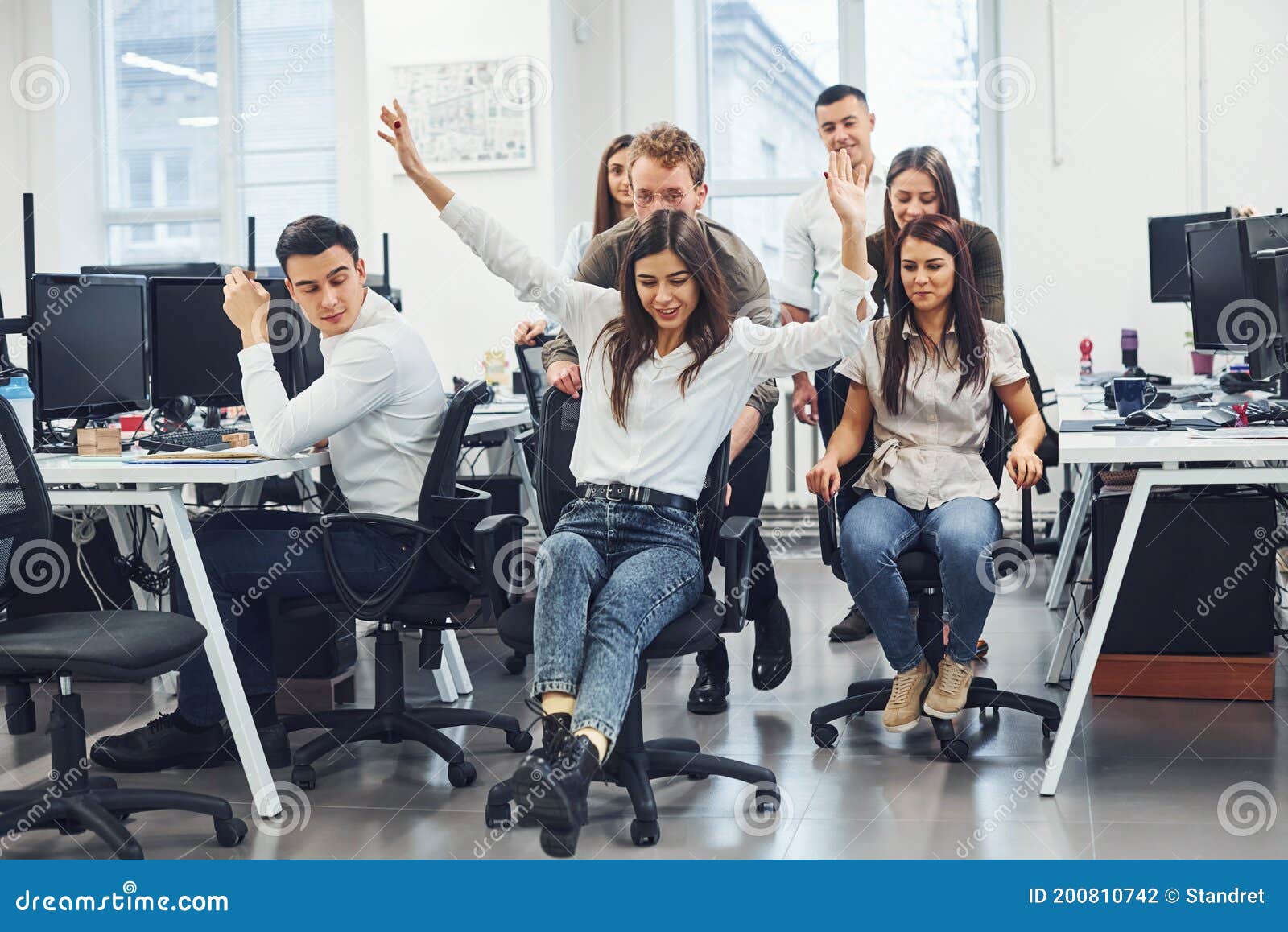 Positive Young People Have Fun at Break Time in the Office Stock Photo ...