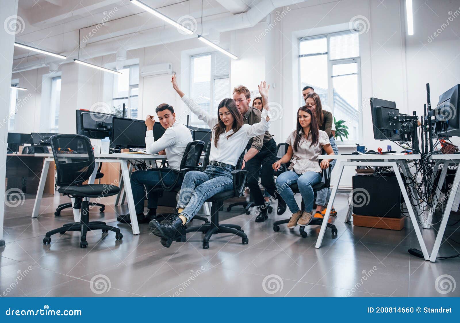Positive Young People Have Fun at Break Time in the Office Stock Photo ...