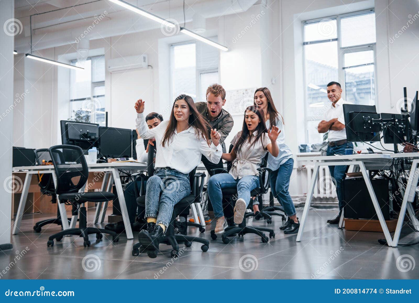 Positive Young People Have Fun at Break Time in the Office Stock Photo ...