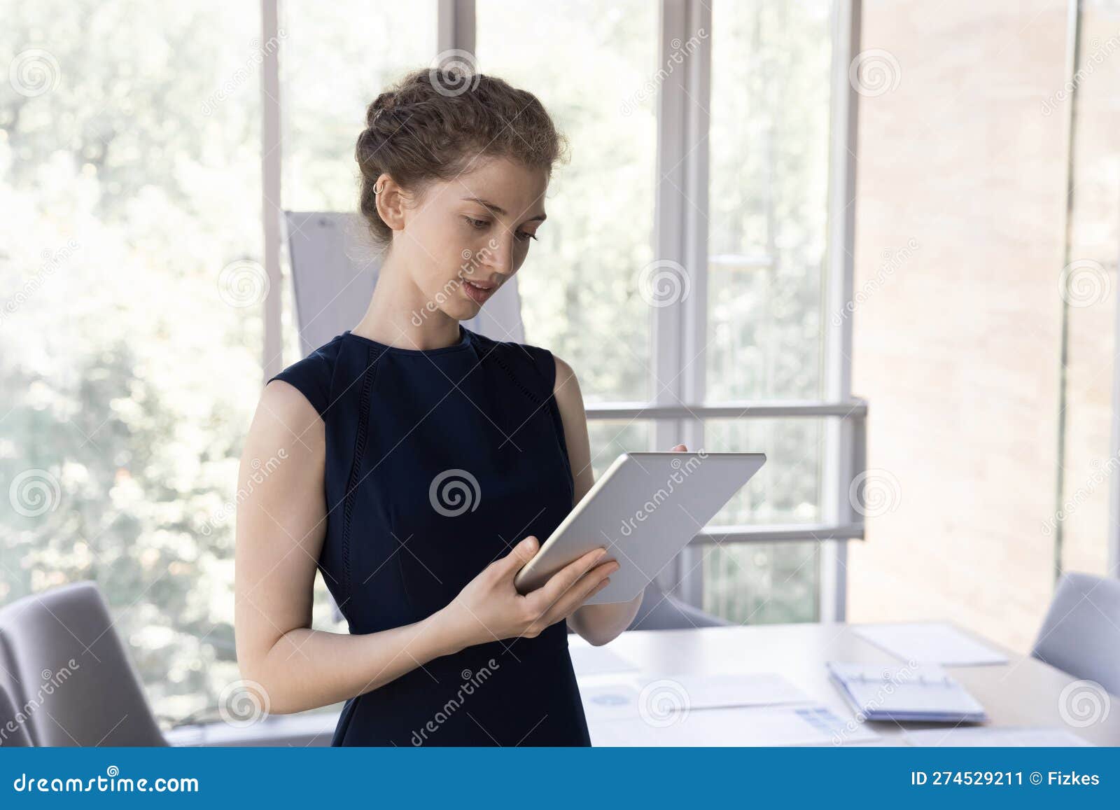 Positive Young Pretty Office Worker Girl Using Tablet Computer Stock ...