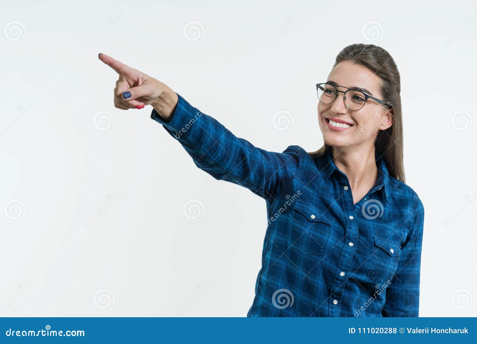 Positive Young Woman Pointing His Finger on Abstract Light Background ...