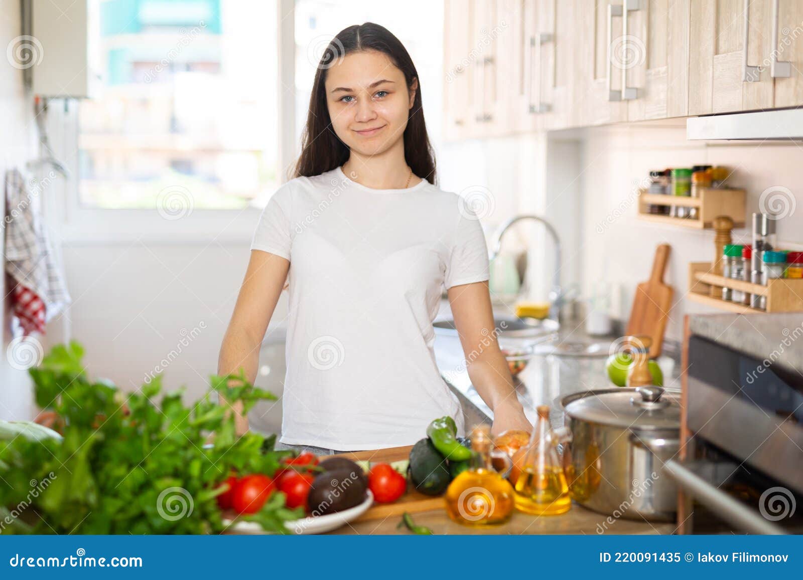 Portrait of Young Woman Posing in Kitchen Stock Image - Image of ...