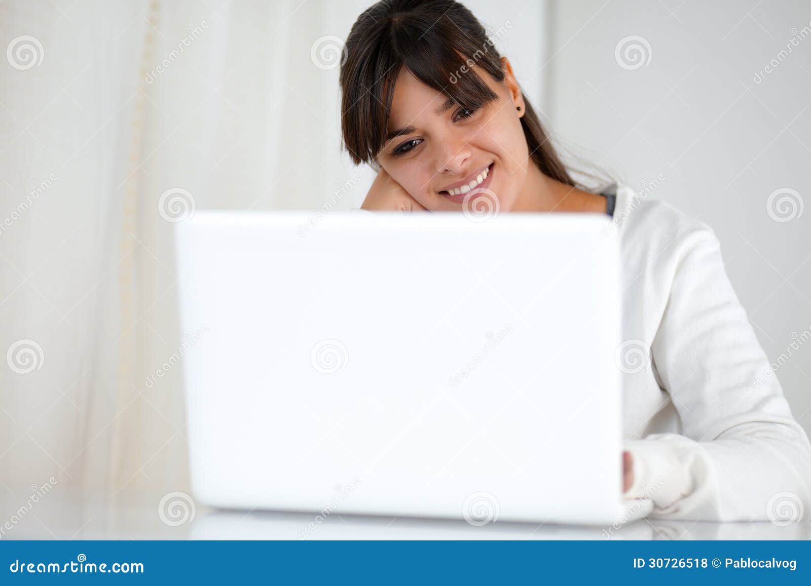 Positive Young Woman Using Her Laptop Computer Stock Photo - Image of ...
