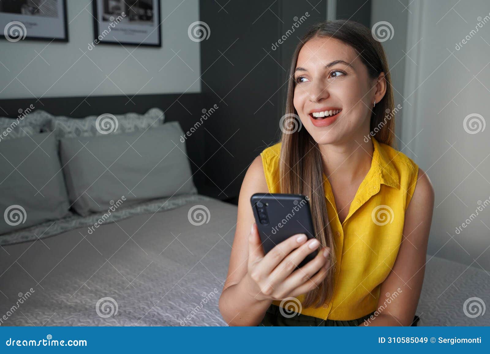 Positive Young Woman Using Smartphone at Home. Internet Connection ...