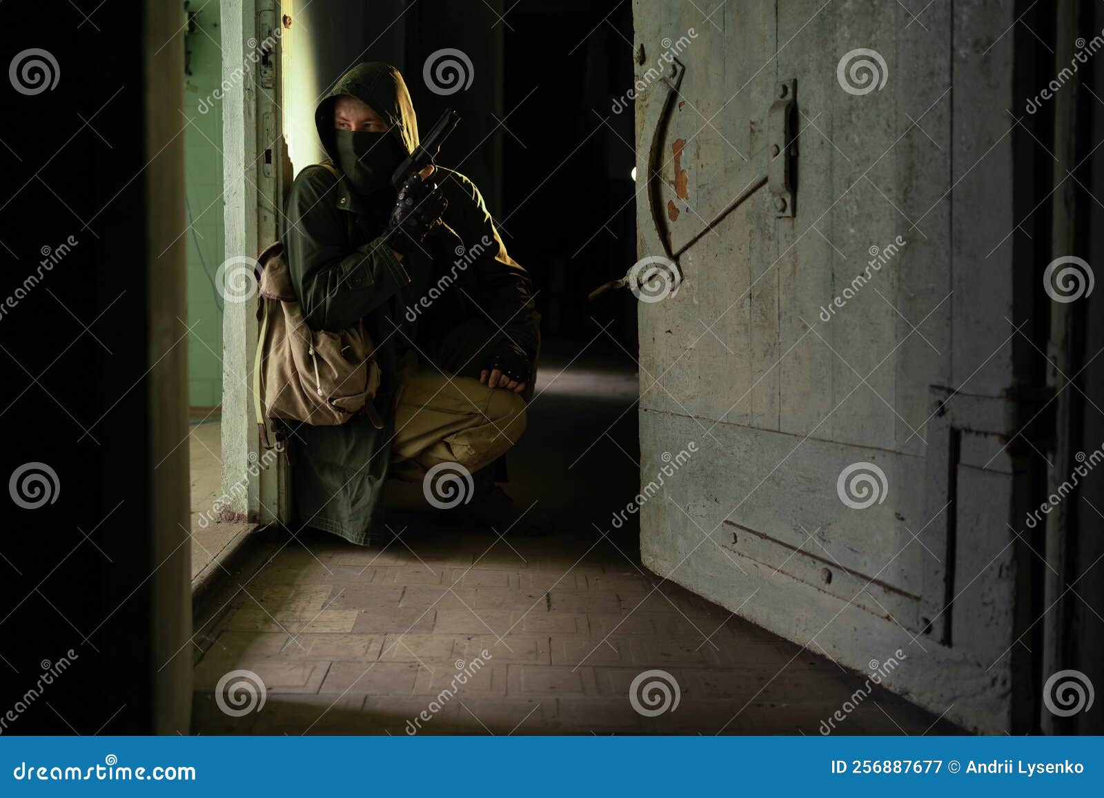 A Post Apocalypse Soldier or Stalker on a Abandoned Area with a Gun and ...