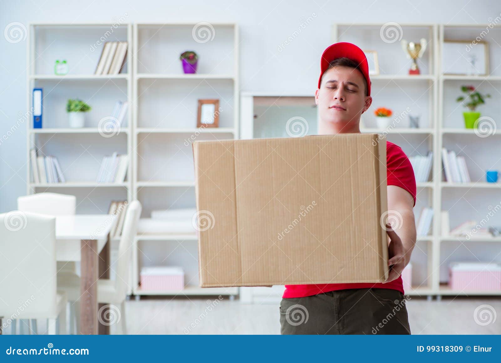 The Post Man Delivering a Parcel Package Stock Image - Image of heavy ...