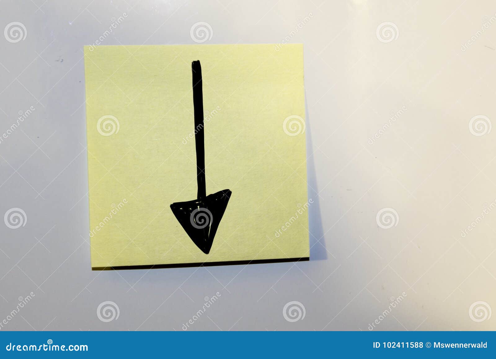 Post-it Note with an Arrow Written in Black Stock Photo - Image of ...