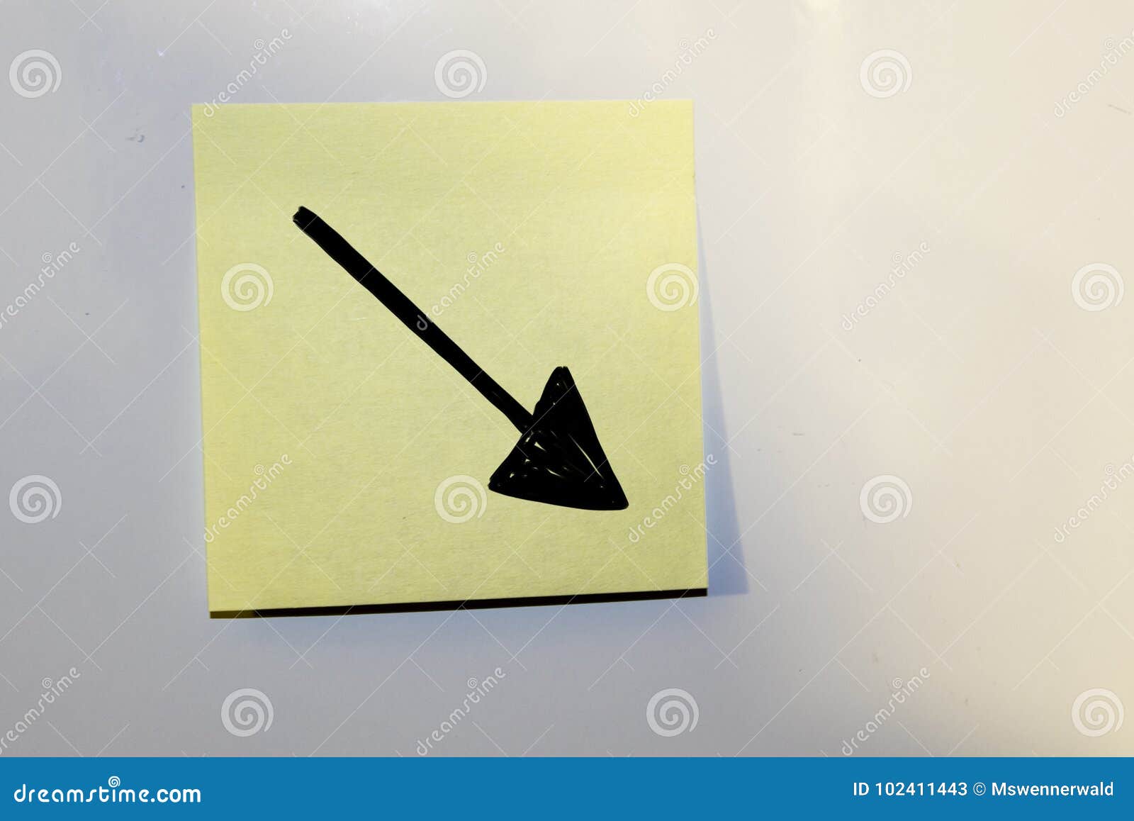 Post-it Note with an Arrow Written in Black Stock Image - Image of ...