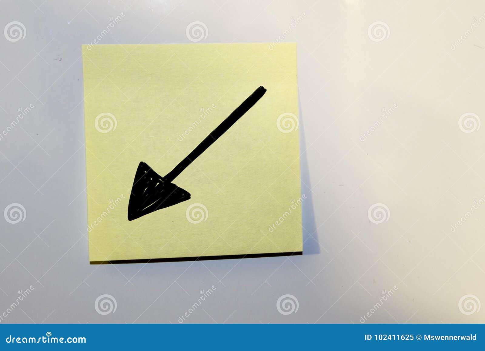 Post-it Note with an Arrow Written in Black Stock Image - Image of ...