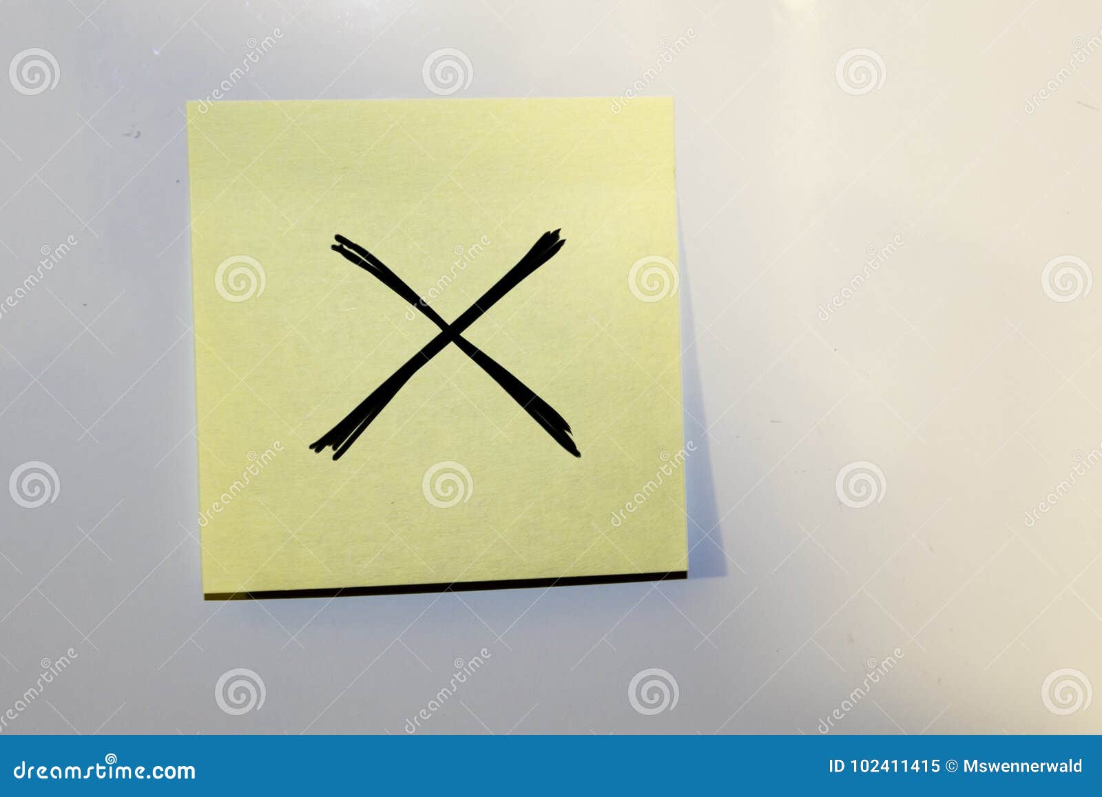Post-it note with a cross. stock image. Image of whiteboard - 102411415