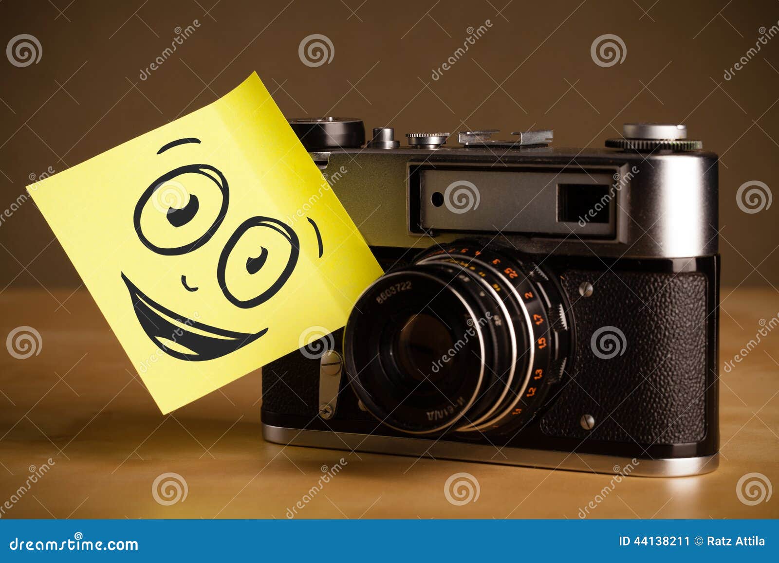 Post-it Note with Smiley Face Sticked on Photo Camera Stock Image ...