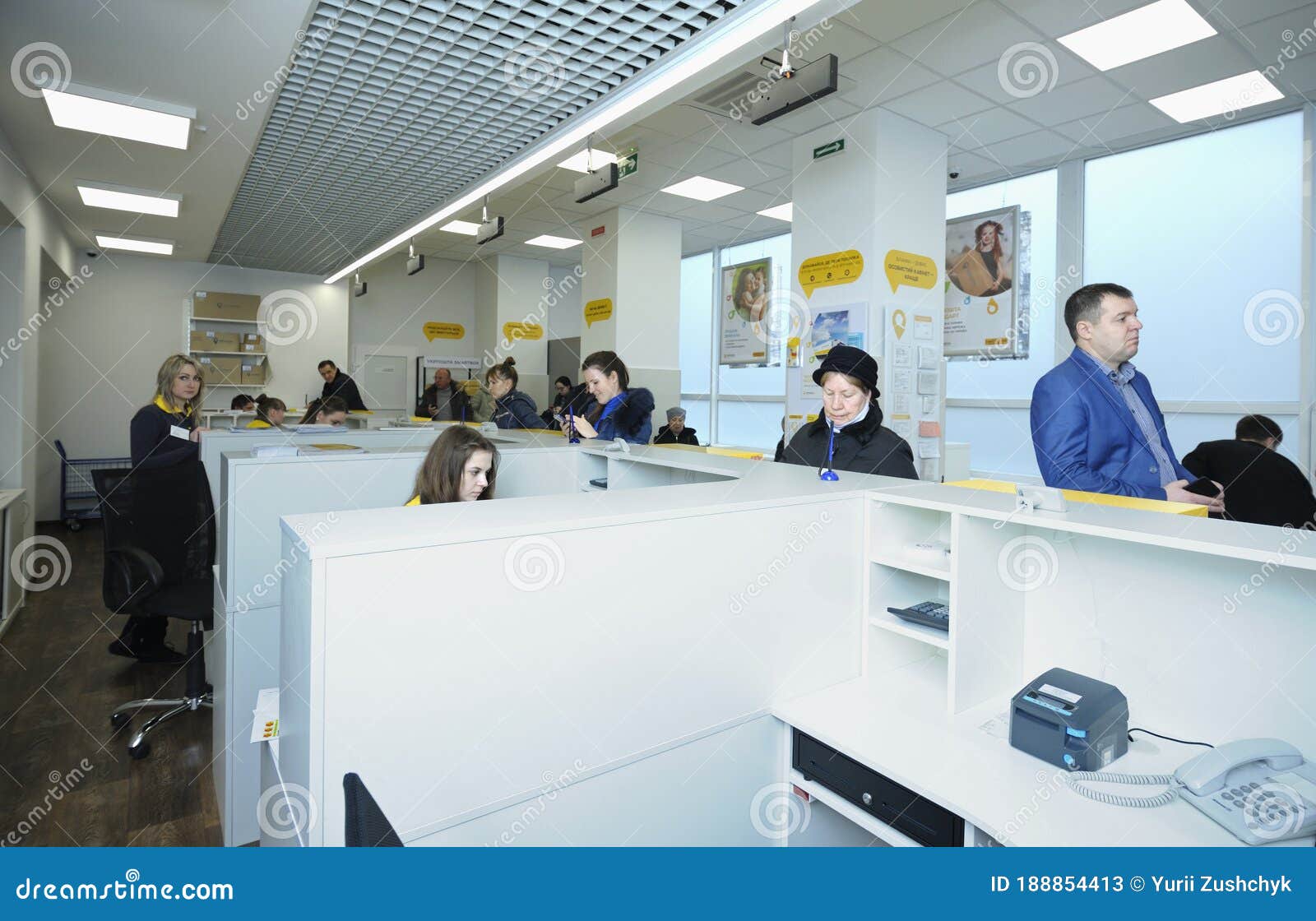 At the Post Office, Reception: Postal Worker Sitting at the Desk Set ...