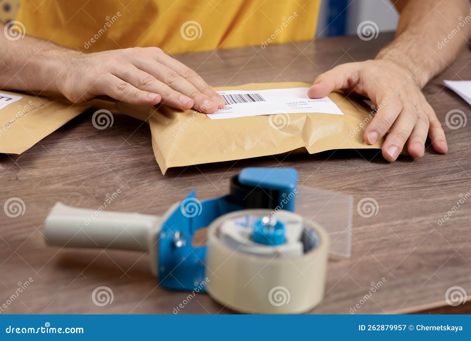 Post Office Worker Sticking Barcode on Parcel at Counter Indoors ...