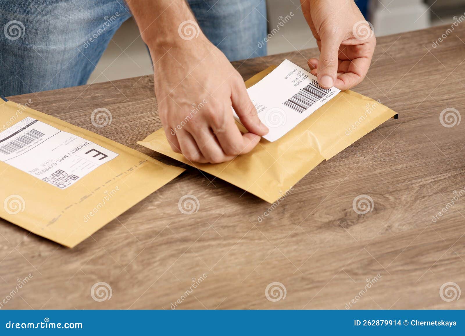 Post Office Worker Sticking Barcode on Parcel at Counter Indoors ...