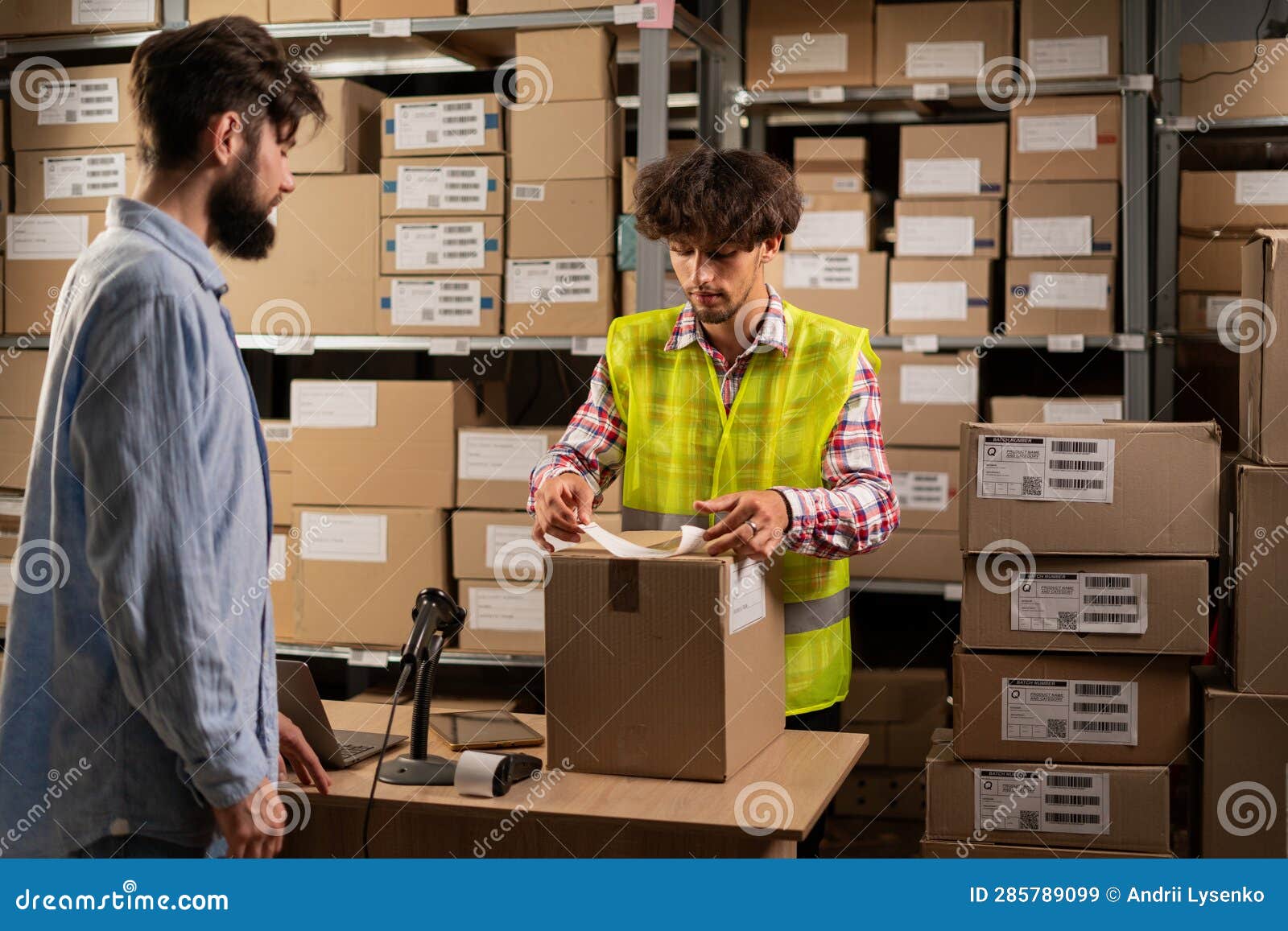 Post Office Worker Sticking Barcode on Parcel at Counter Indoors ...
