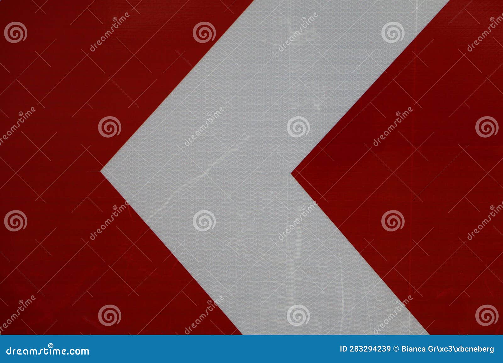 A Post-shot of a Warning Sign for a Sharp Left Turn Stock Image - Image ...