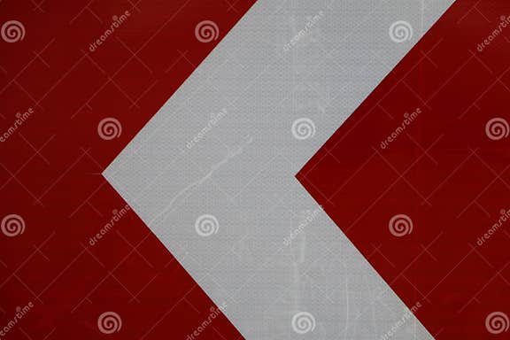 A Post-shot of a Warning Sign for a Sharp Left Turn Stock Image - Image ...