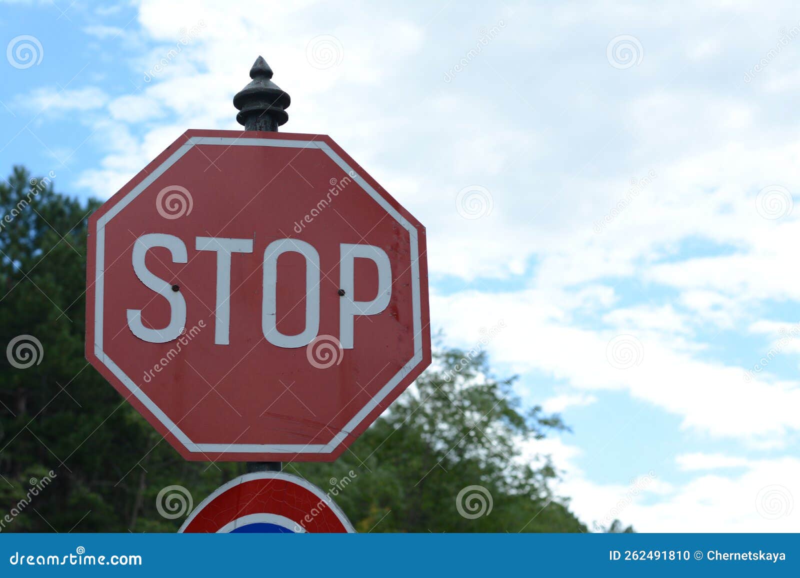 Post with Stop Sign Against Blue Sky Stock Photo - Image of sign ...