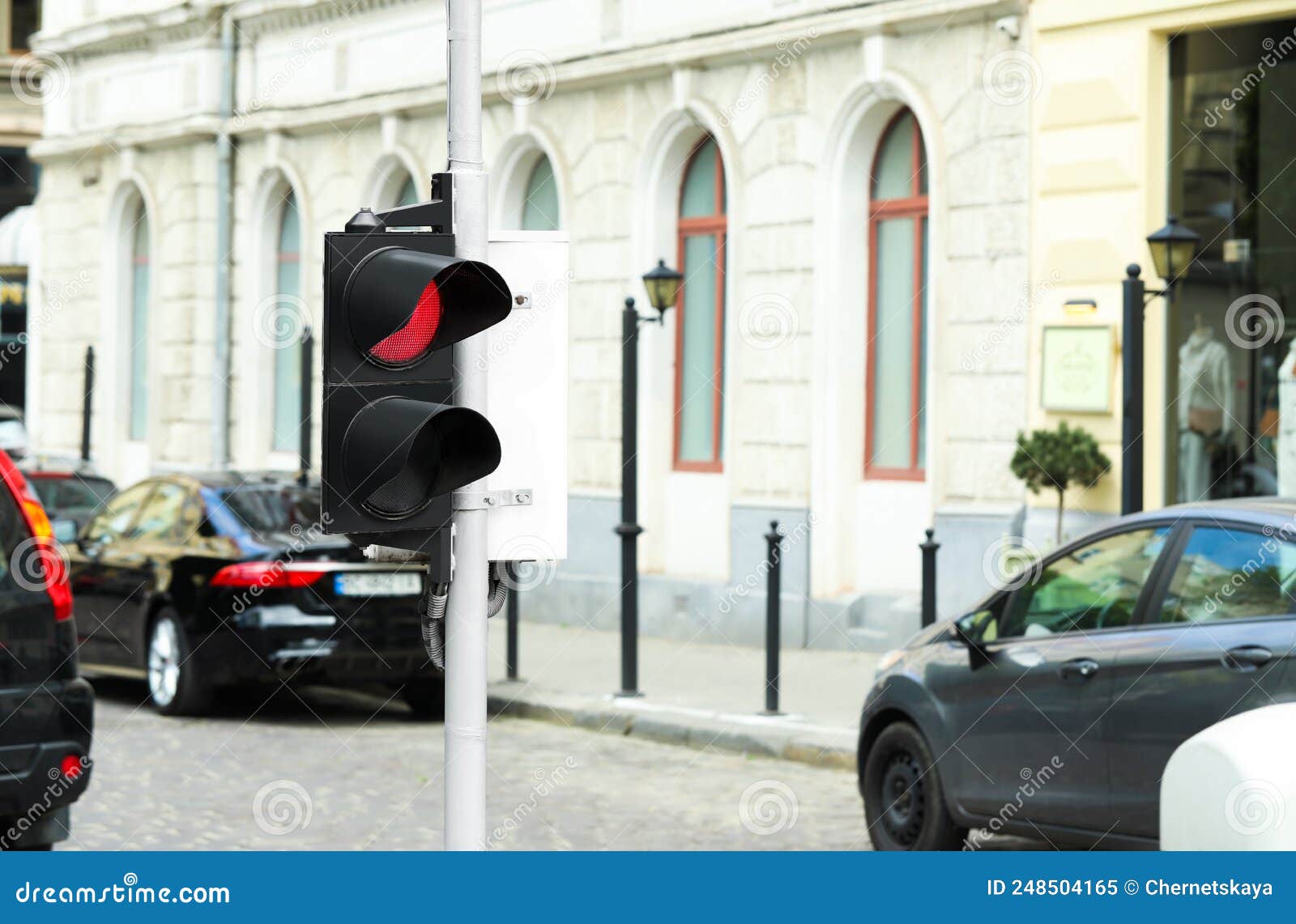 Post with Traffic Light on City Street Stock Image - Image of safety ...