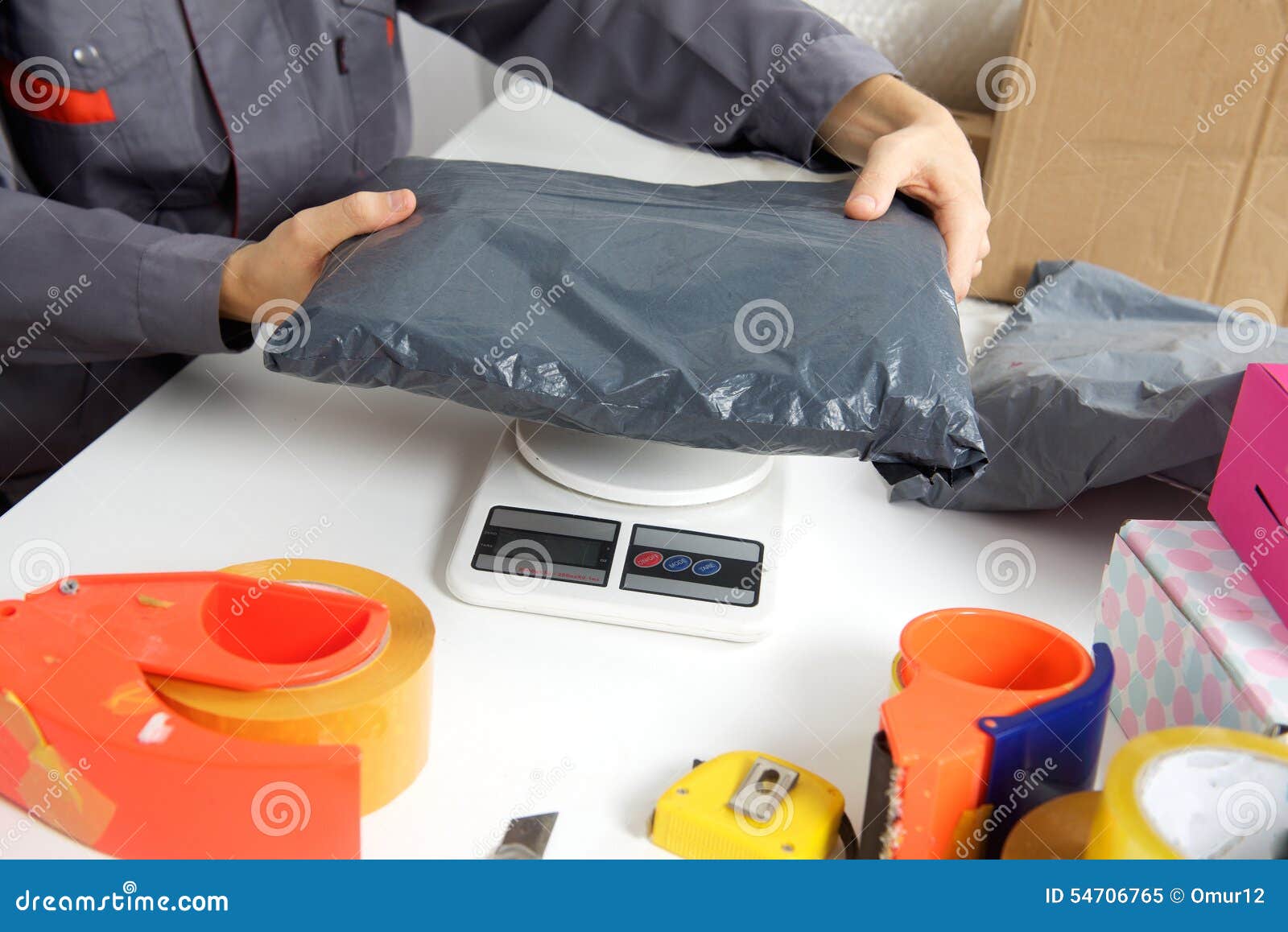 Post Worker Weighs the Parcel Stock Image - Image of company, scales ...