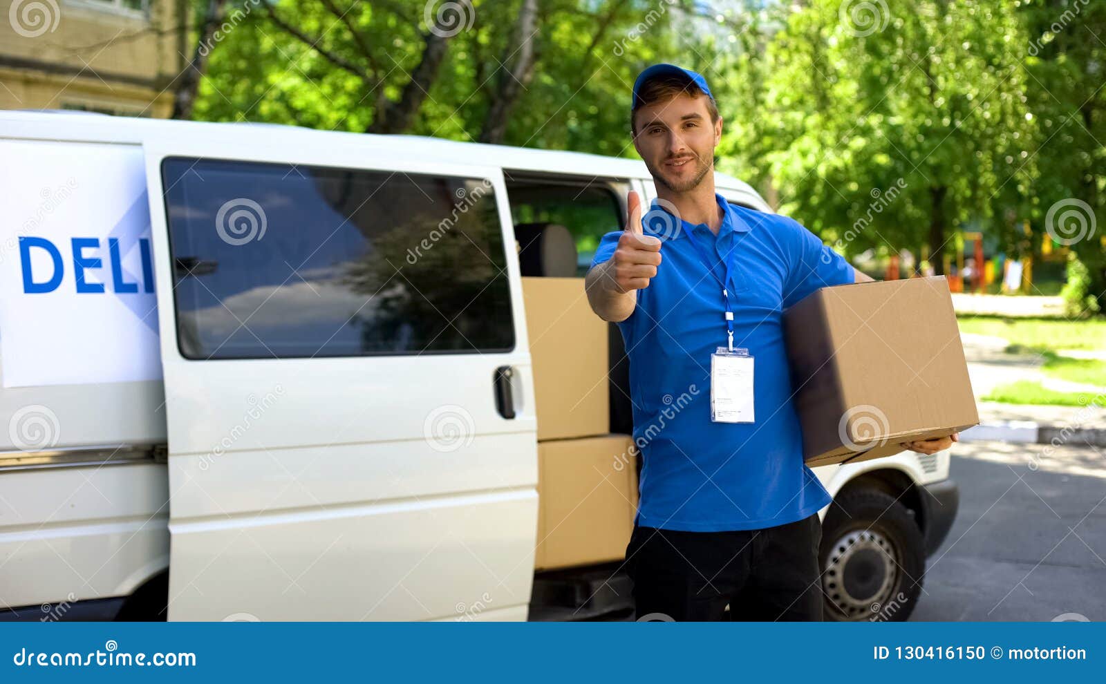 Postal Office Worker Taking Parcel Box from Delivery Van and Showing ...