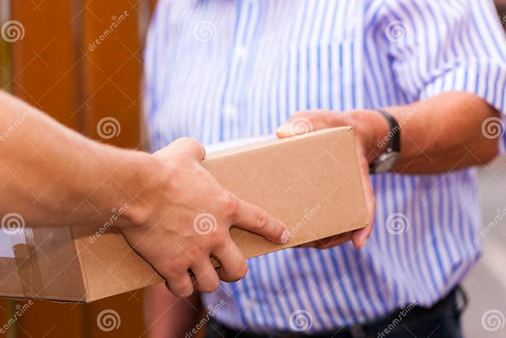Postal Service - Delivery of a Package Stock Photo - Image of work ...