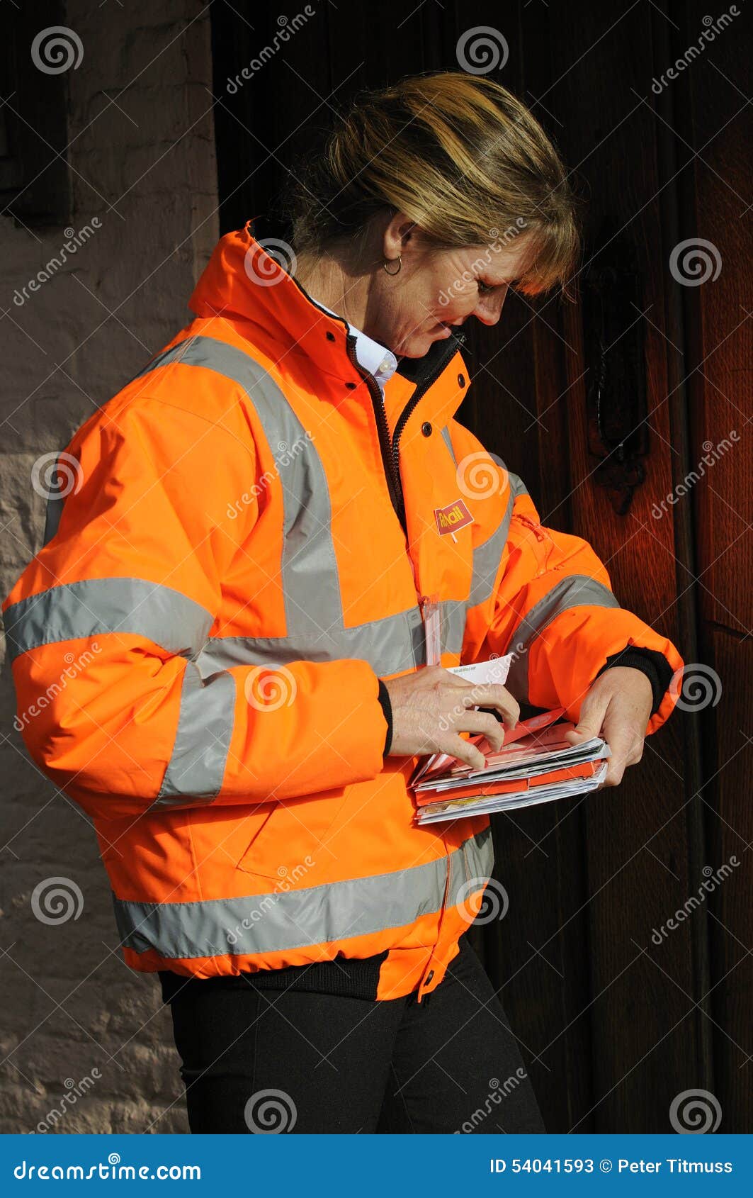 Postal worker sorting mail stock image. Image of delivering - 54041593