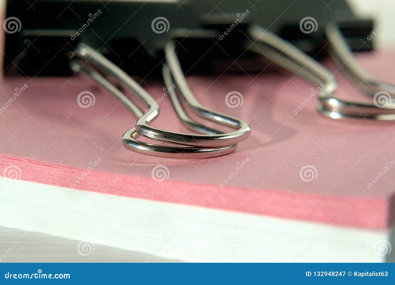 Poster Clips on a Stack of Stickers Stock Image - Image of liner, clip ...