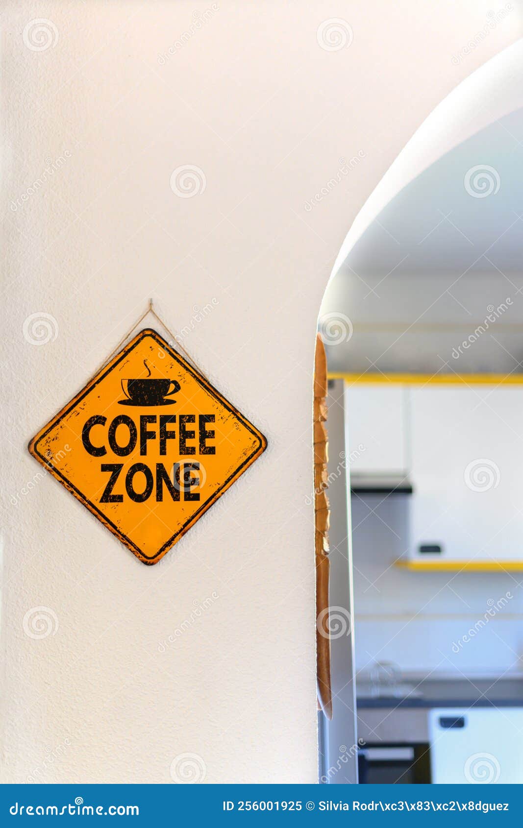 Poster Hanging Yellow on a Wall that Reads: Coffee Zone Stock Image ...