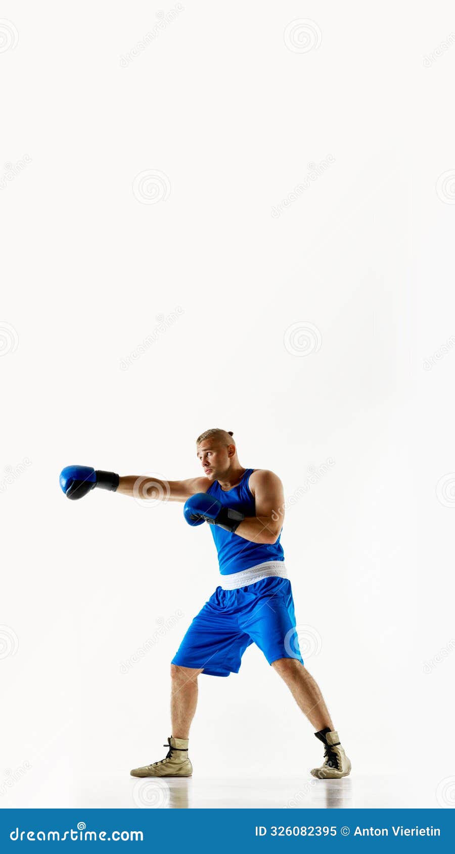 Poster. Side View Photo of Young Boxer, Practicing Punches and ...