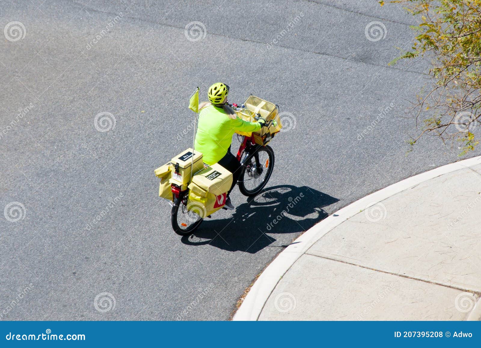 Postman From Australia Post Delivers Mail On A Motorbike In Brisbane ...