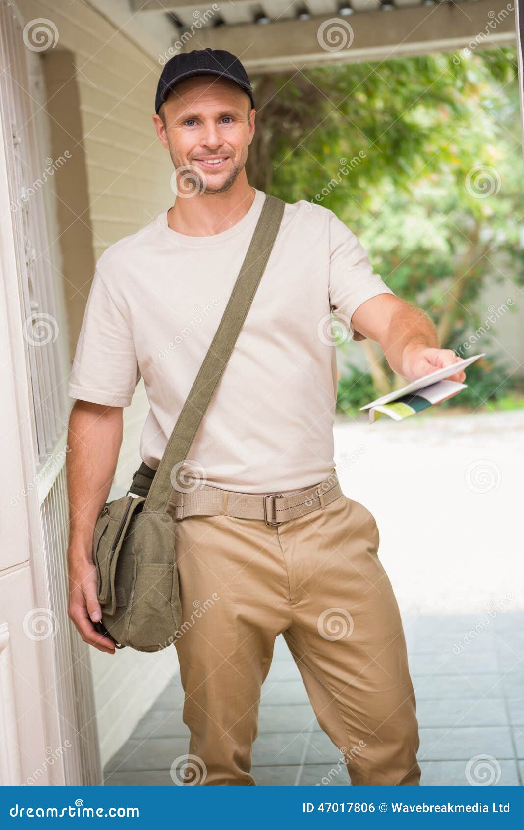 Postman Delivering a Letter Stock Photo - Image of friendly, postal ...