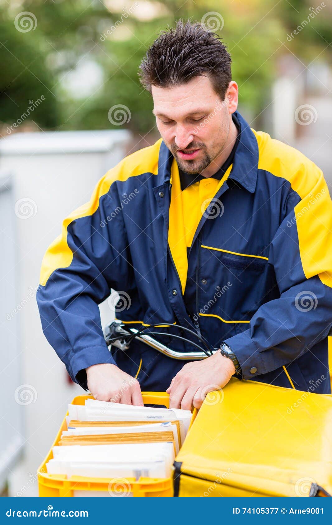 Postman Delivering Letters To Mailbox of Recipient Stock Image - Image ...