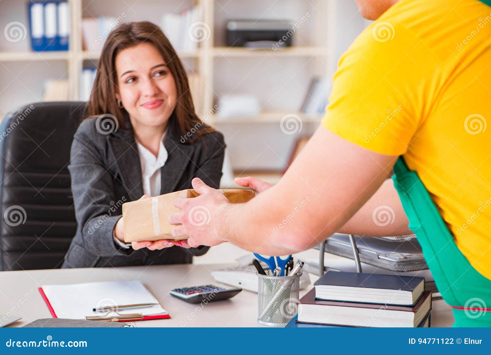 The Postman Delivering Parcel To the Office Stock Photo - Image of gift ...