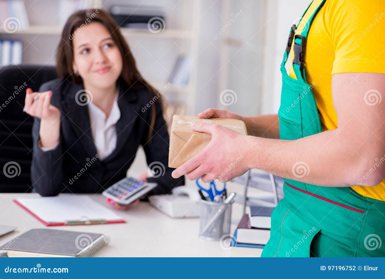 The Postman Delivering Parcel To the Office Stock Photo - Image of ...