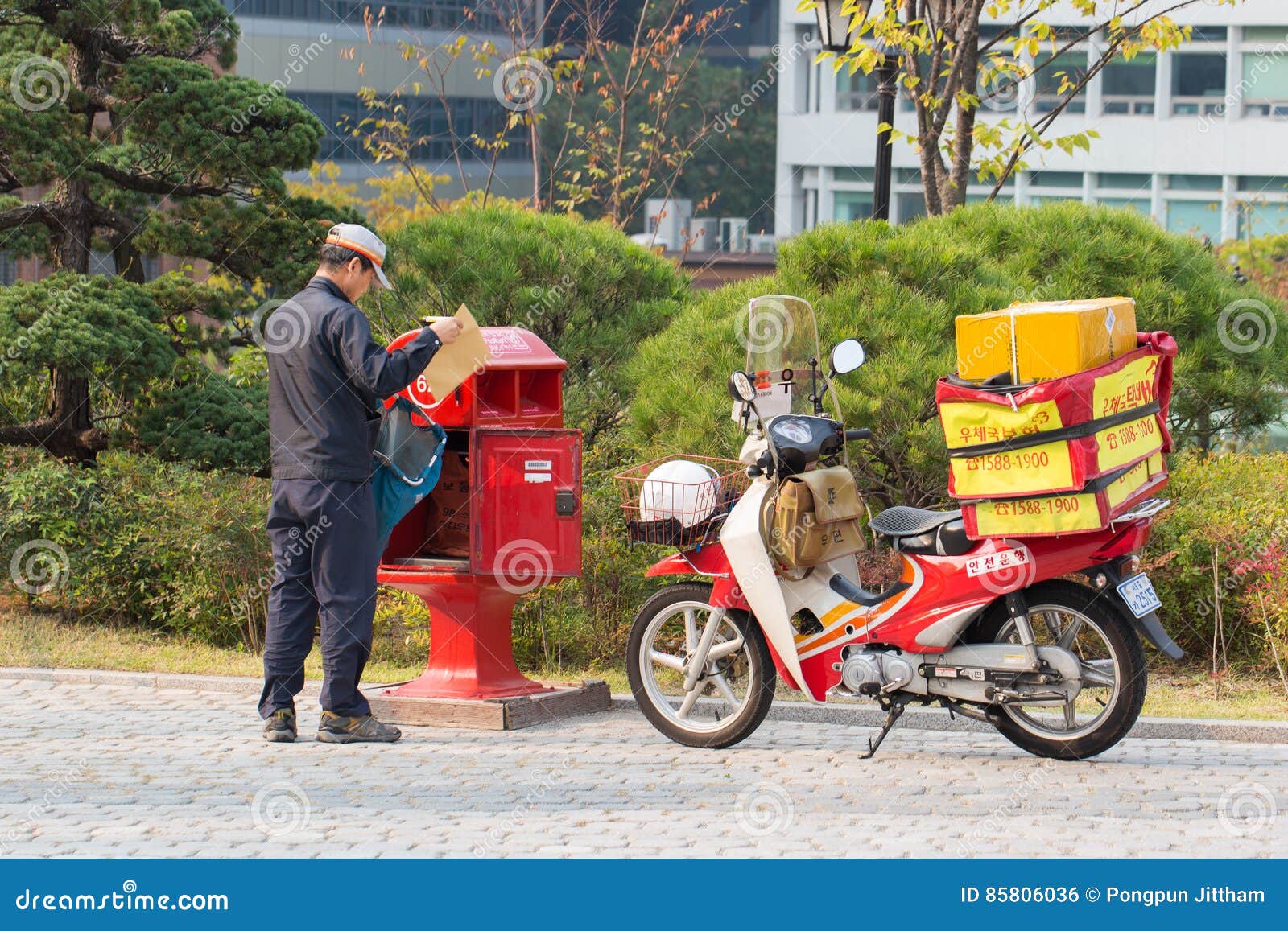 Postman with Motorcycle and Mail. Editorial Photo - Image of cargo ...