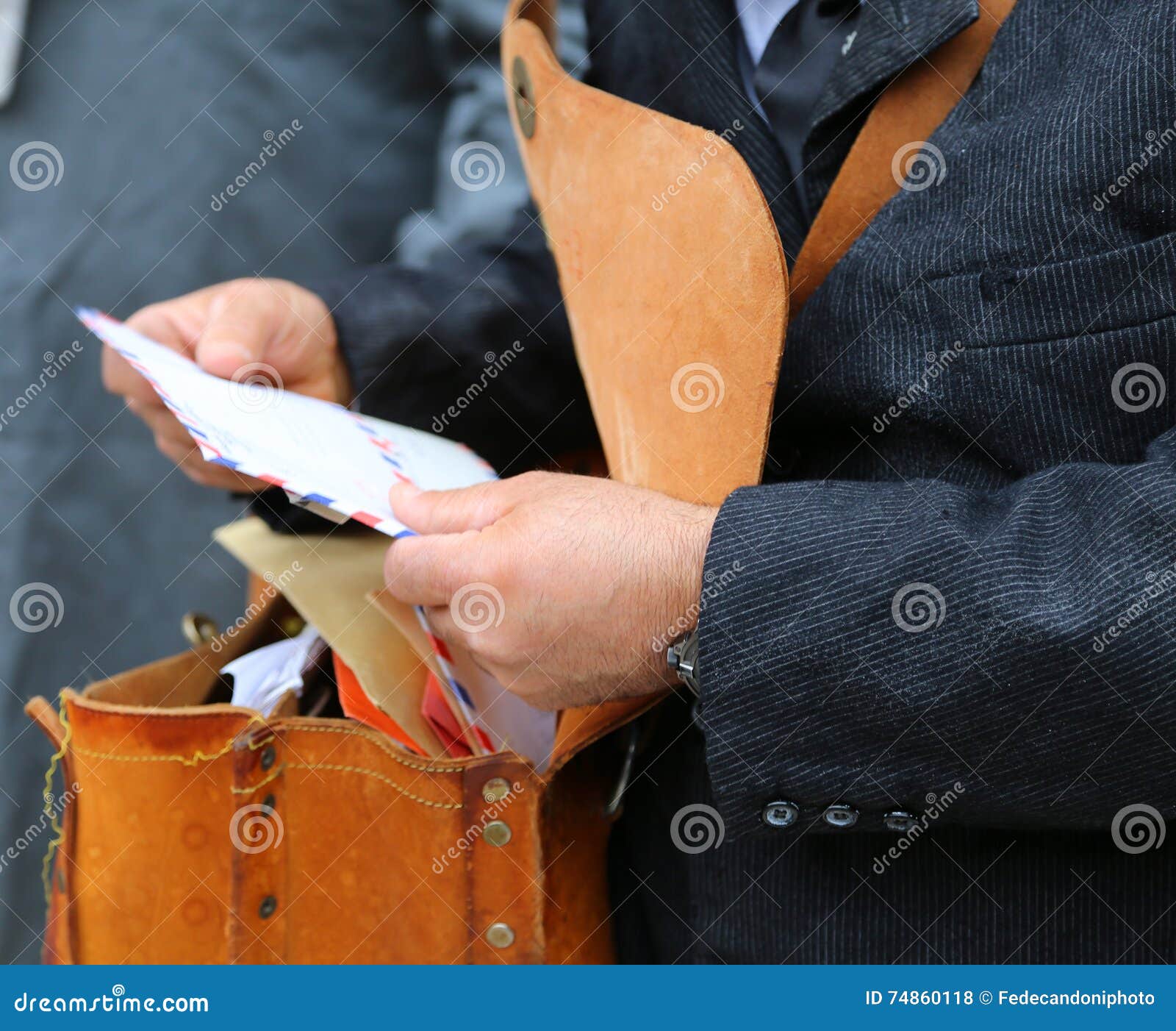 Postman with the Old Bag while Delivering Mail Stock Photo - Image of ...