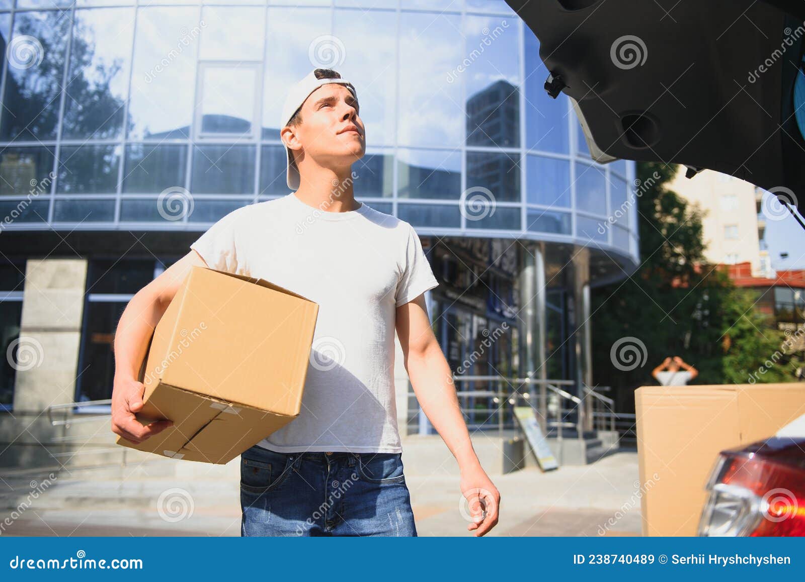 Postman with Parcel Box. Postal Delivery Service Stock Image - Image of ...