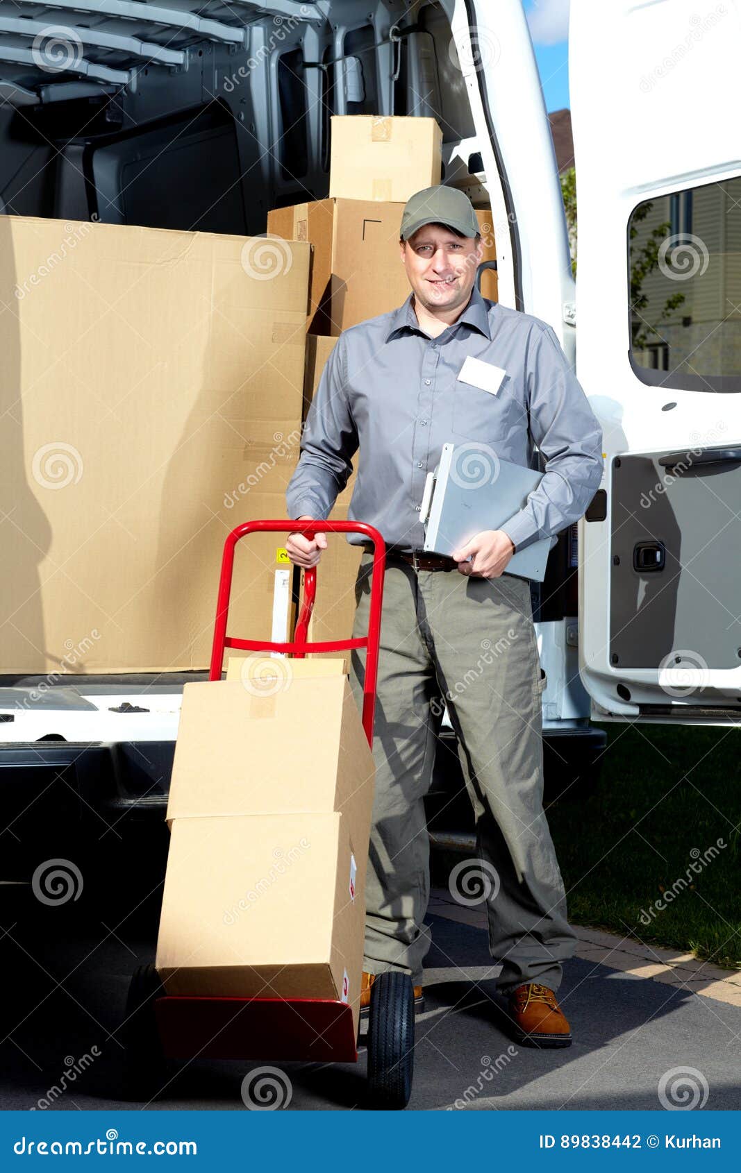 Postman with parcel box. stock photo. Image of commitment - 89838442