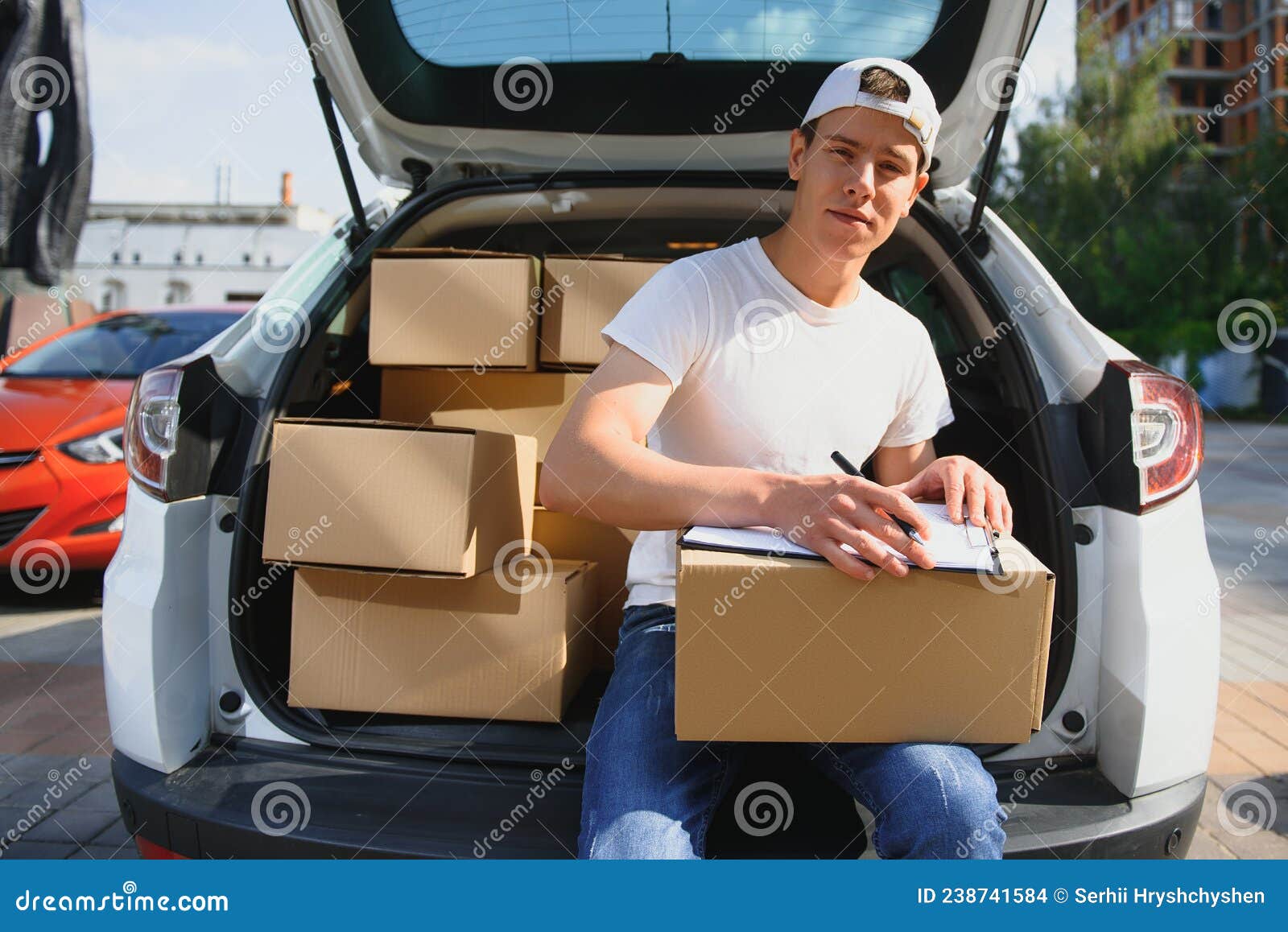 Postman with Parcel Box. Postal Delivery Service Stock Photo - Image of ...