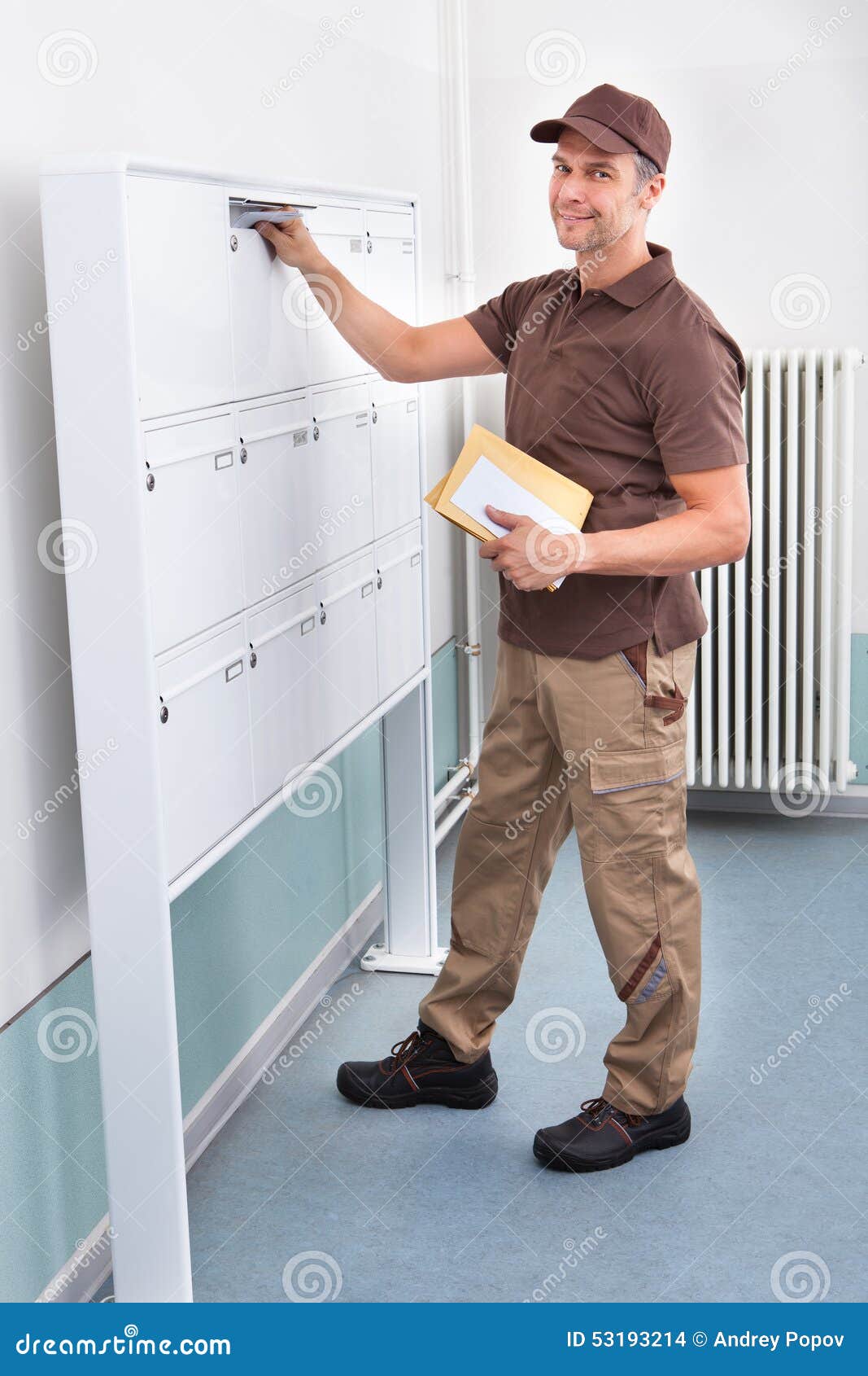 Postman Putting Letters in Mailbox Stock Photo - Image of document ...