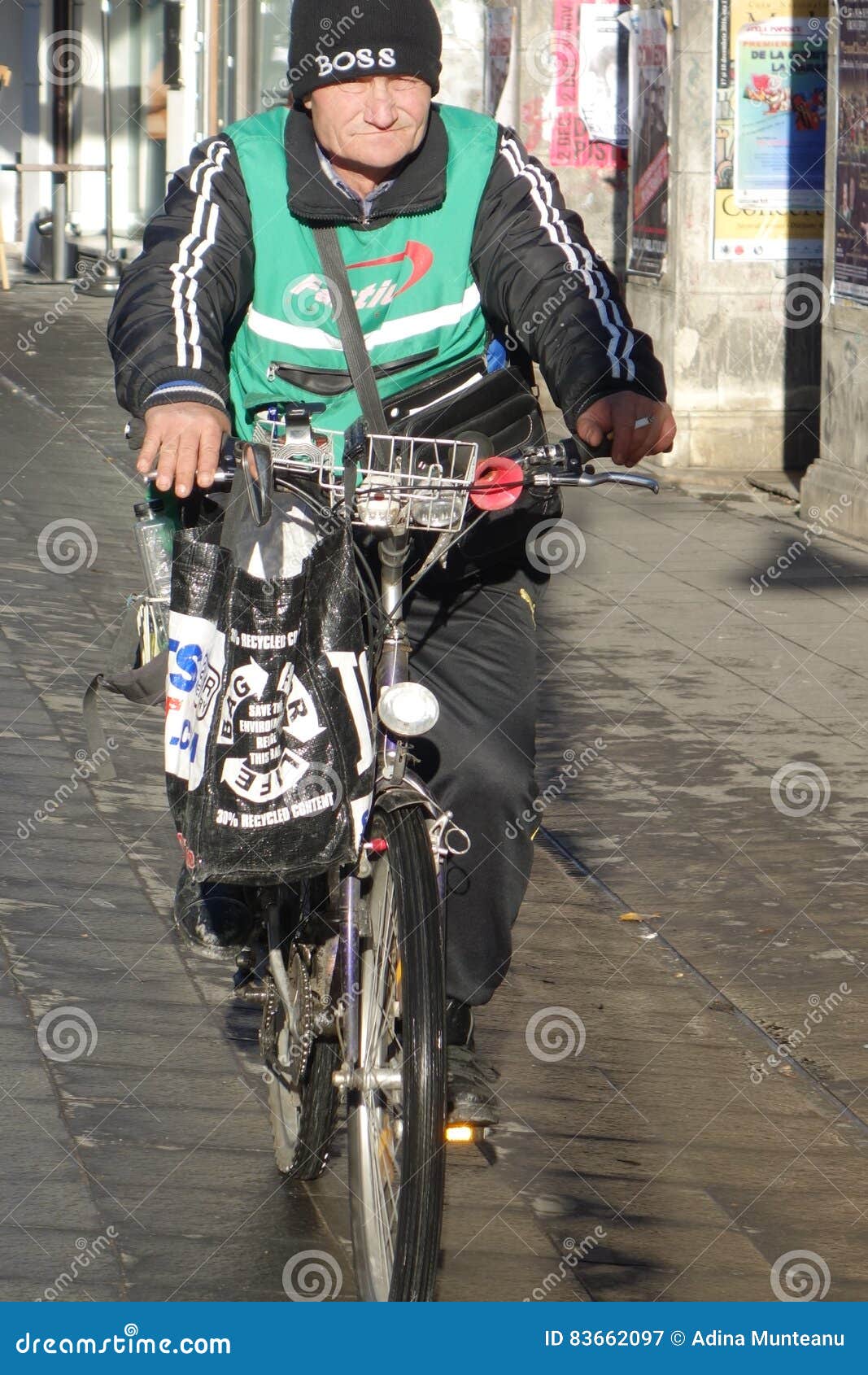 Postman riding bike editorial photography. Image of postman - 83662097
